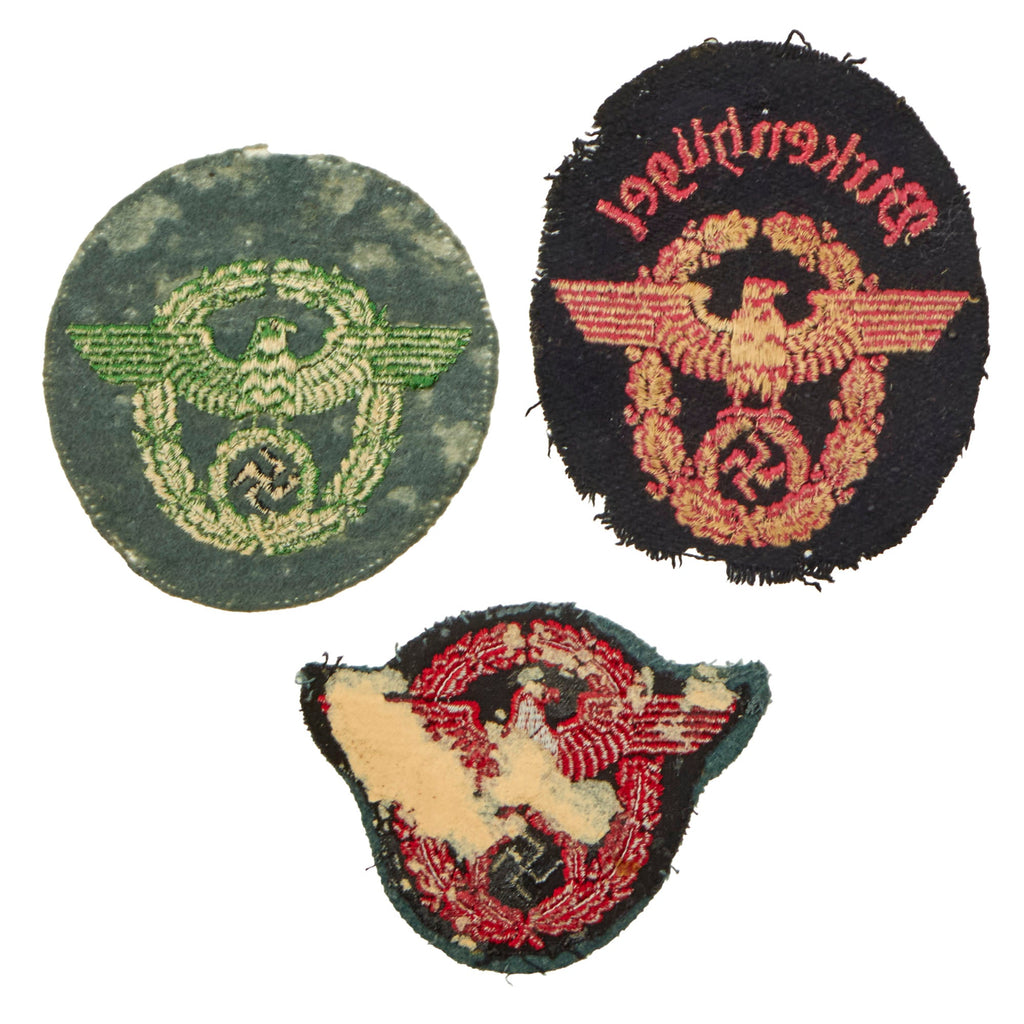 Original German WWII Insignia Grouping with Three Police Arm Patches a ...